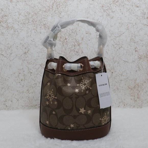 Coach | Bags | Coach Dempsey Star Snowflake Print Drawstring Bucket Bag ...